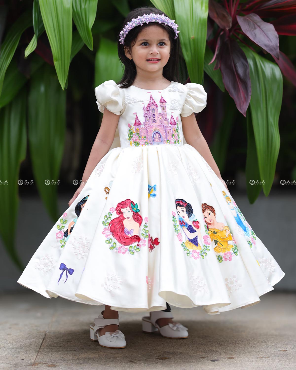 Enchanting frock featuring princesses and a fairytale castle—perfect f ...