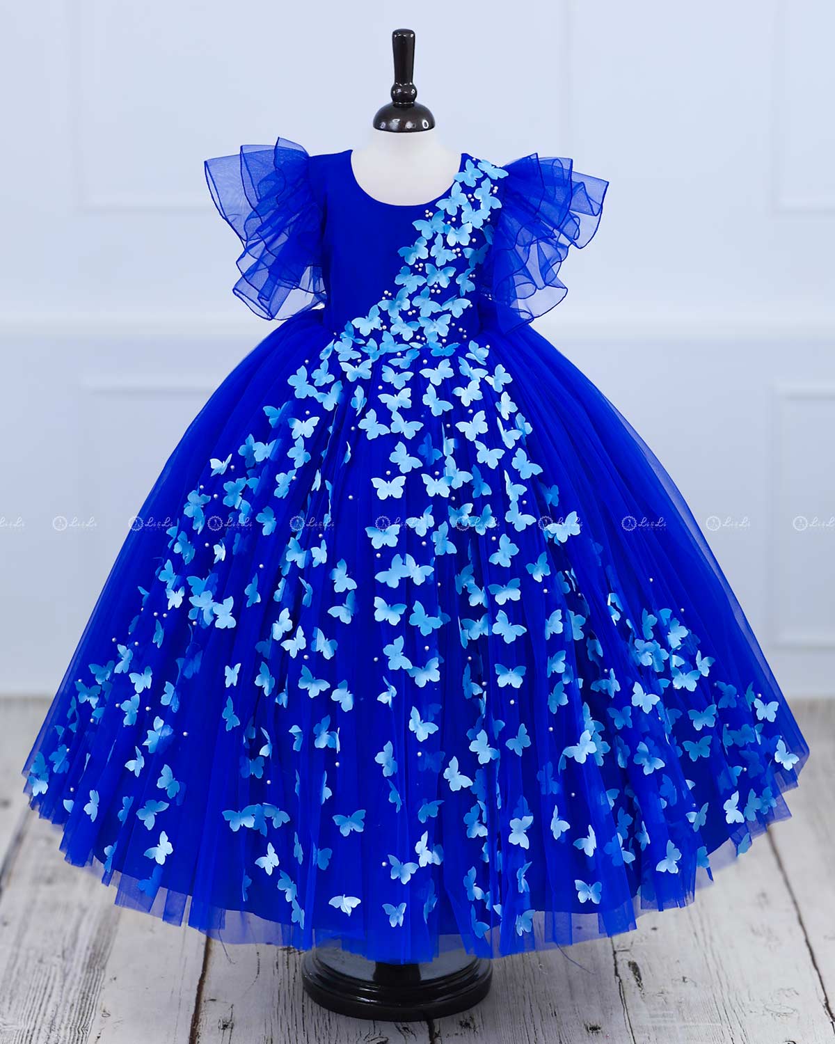 Royal Blue Partywear Frock with Spreaded Sky Blue Butterflies – www ...