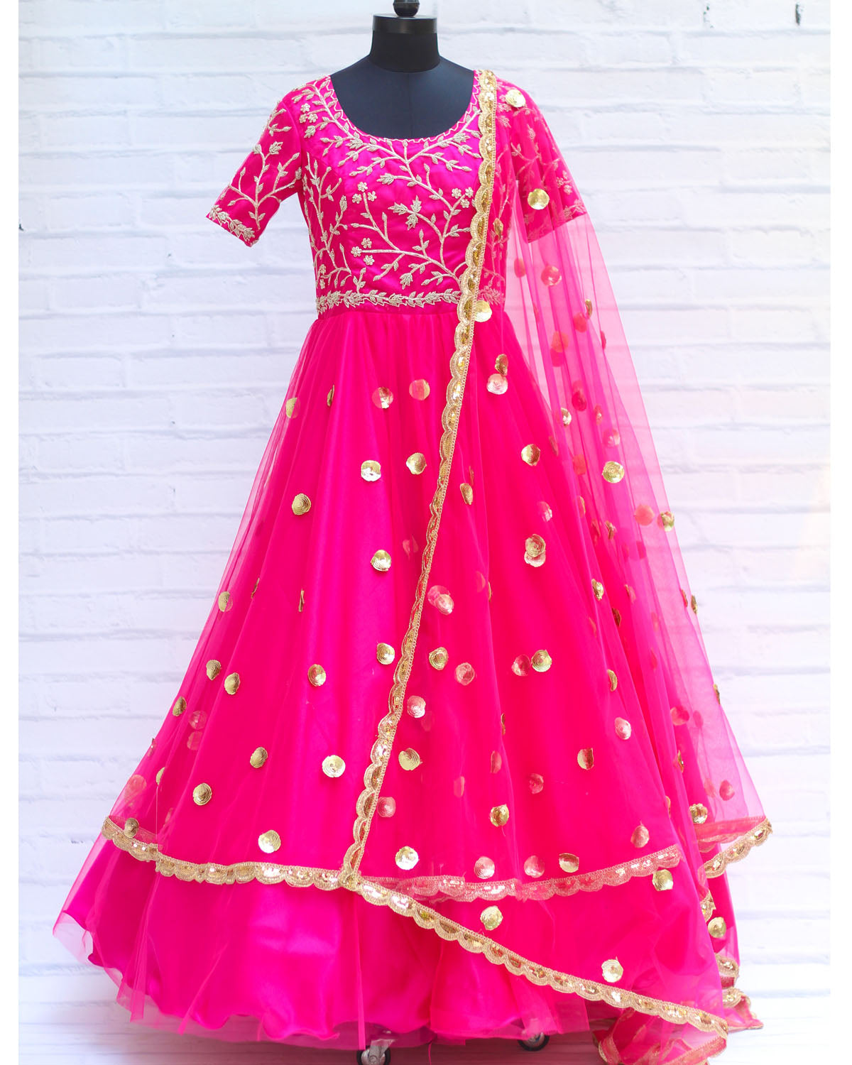 Buy Rani Pink Netted Gown With Hand Worked Yoke And Netted Dupatta ...